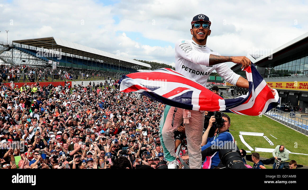 Lewis Hamilton celebrates his victory with the crowd after winning the ...