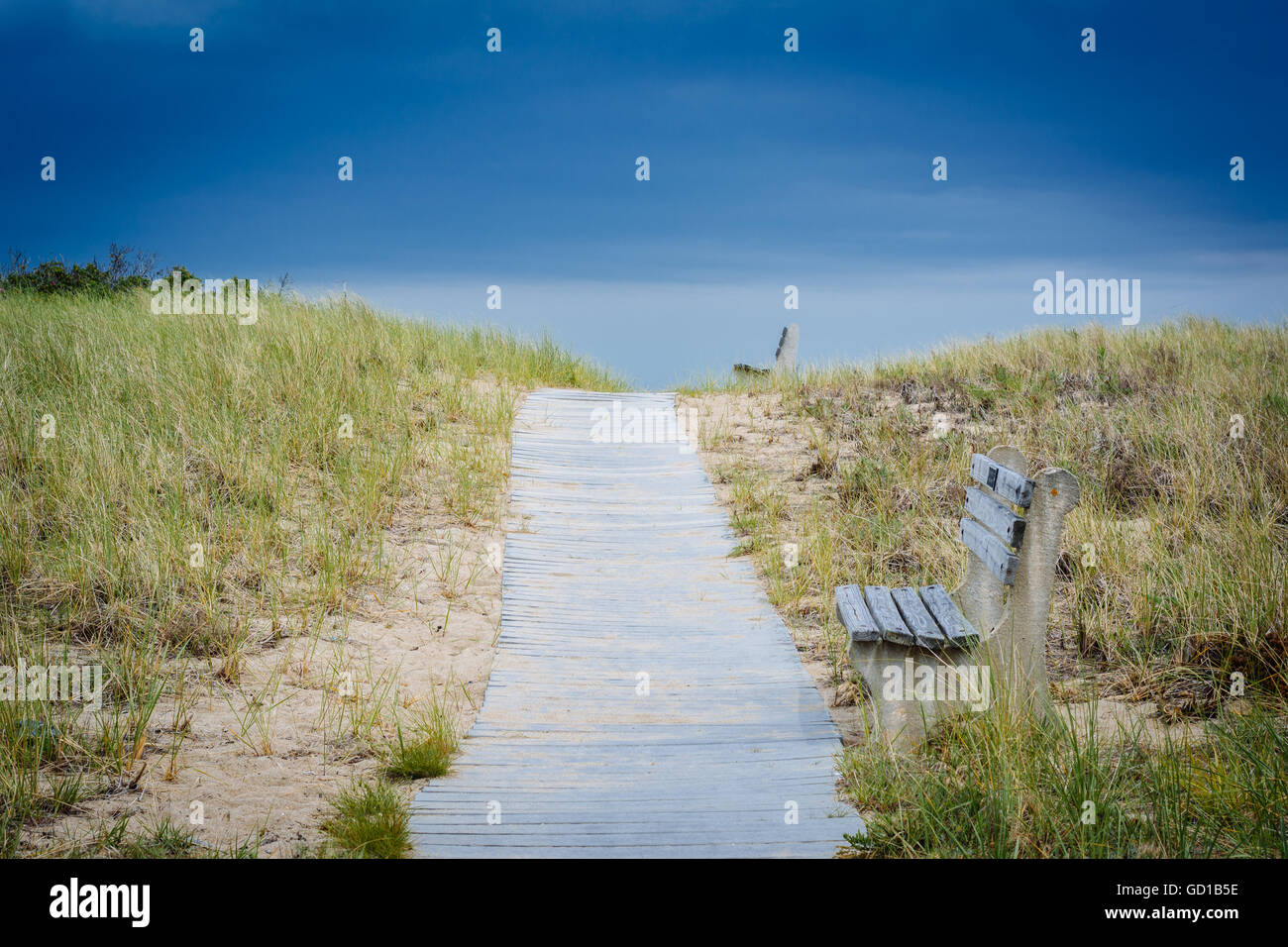 Benches along a walkway over sand dunes to the beach in Seabrook Beach ...