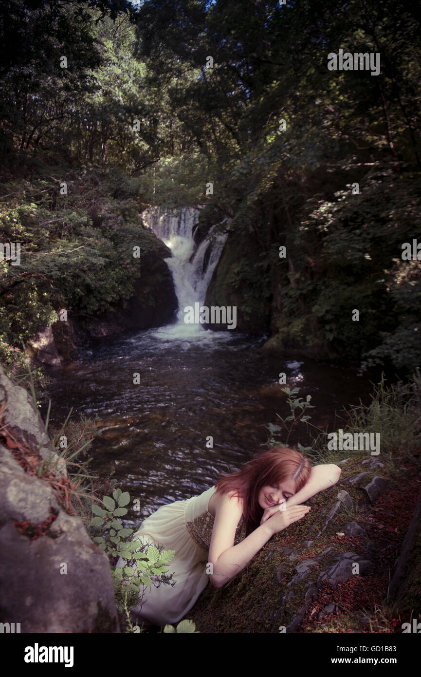 Woodland Fantasy Photography A Young Red Haired Redhead Woman Girl Wearing A Long Flowing Dress