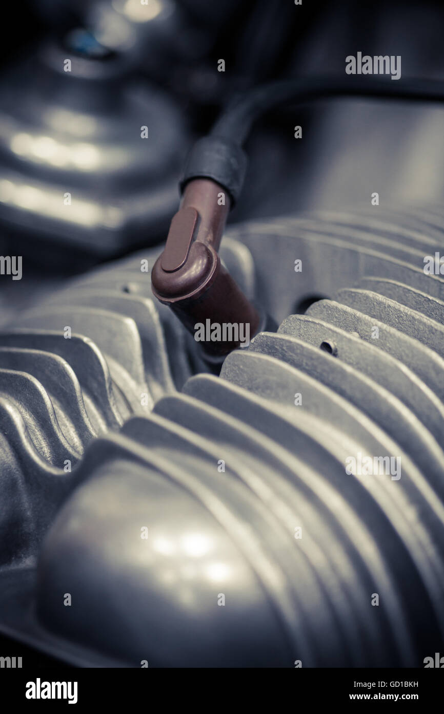 Close up with a motorcycle spark plug Stock Photo - Alamy
