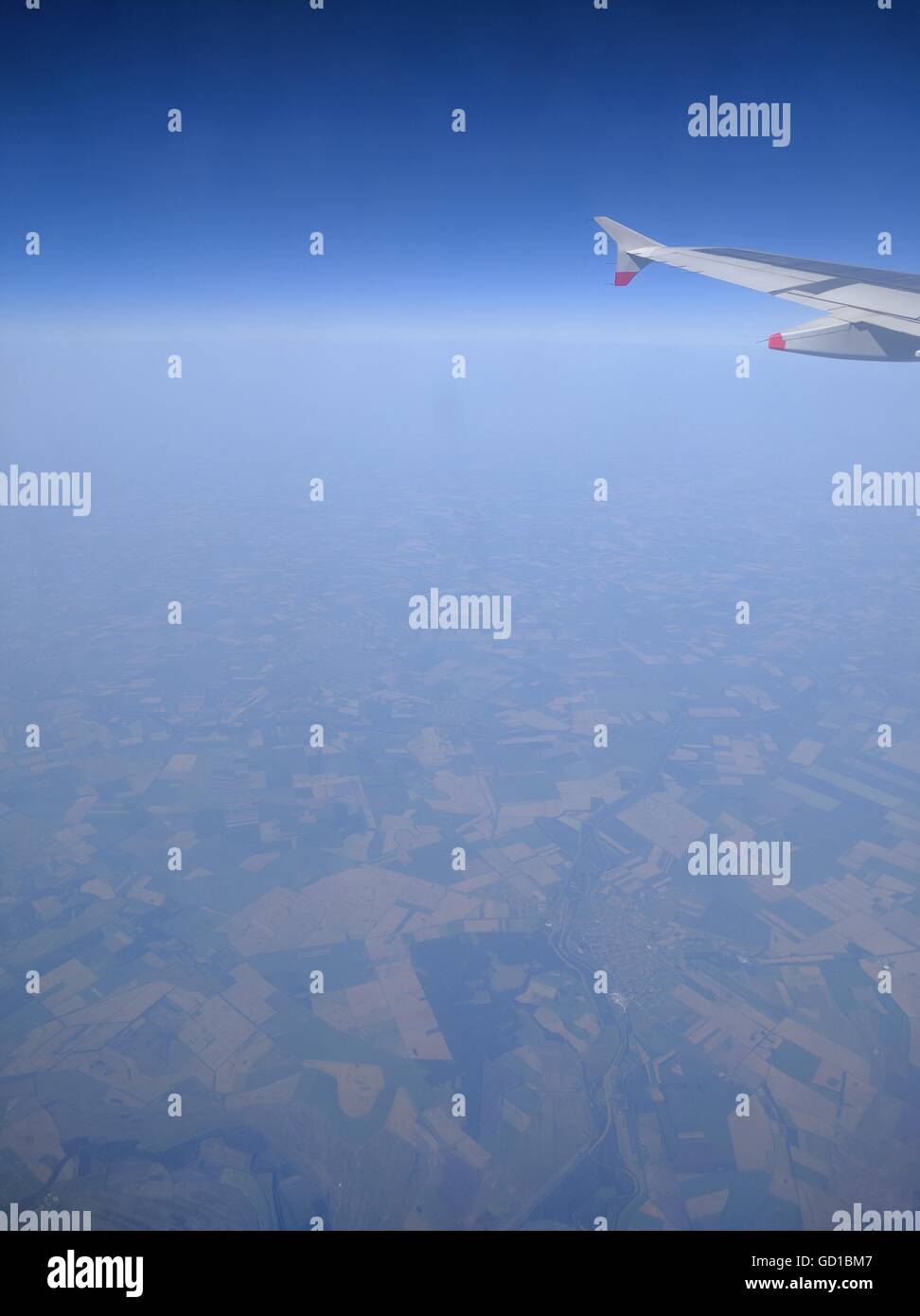 Color image of an airplane wing while flying Stock Photo - Alamy