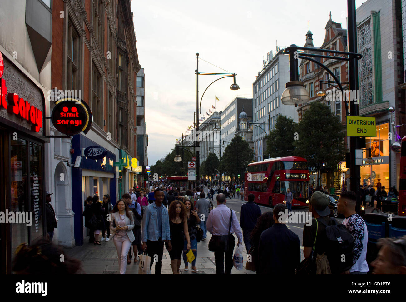 Crowd people walking around shops hi-res stock photography and images ...