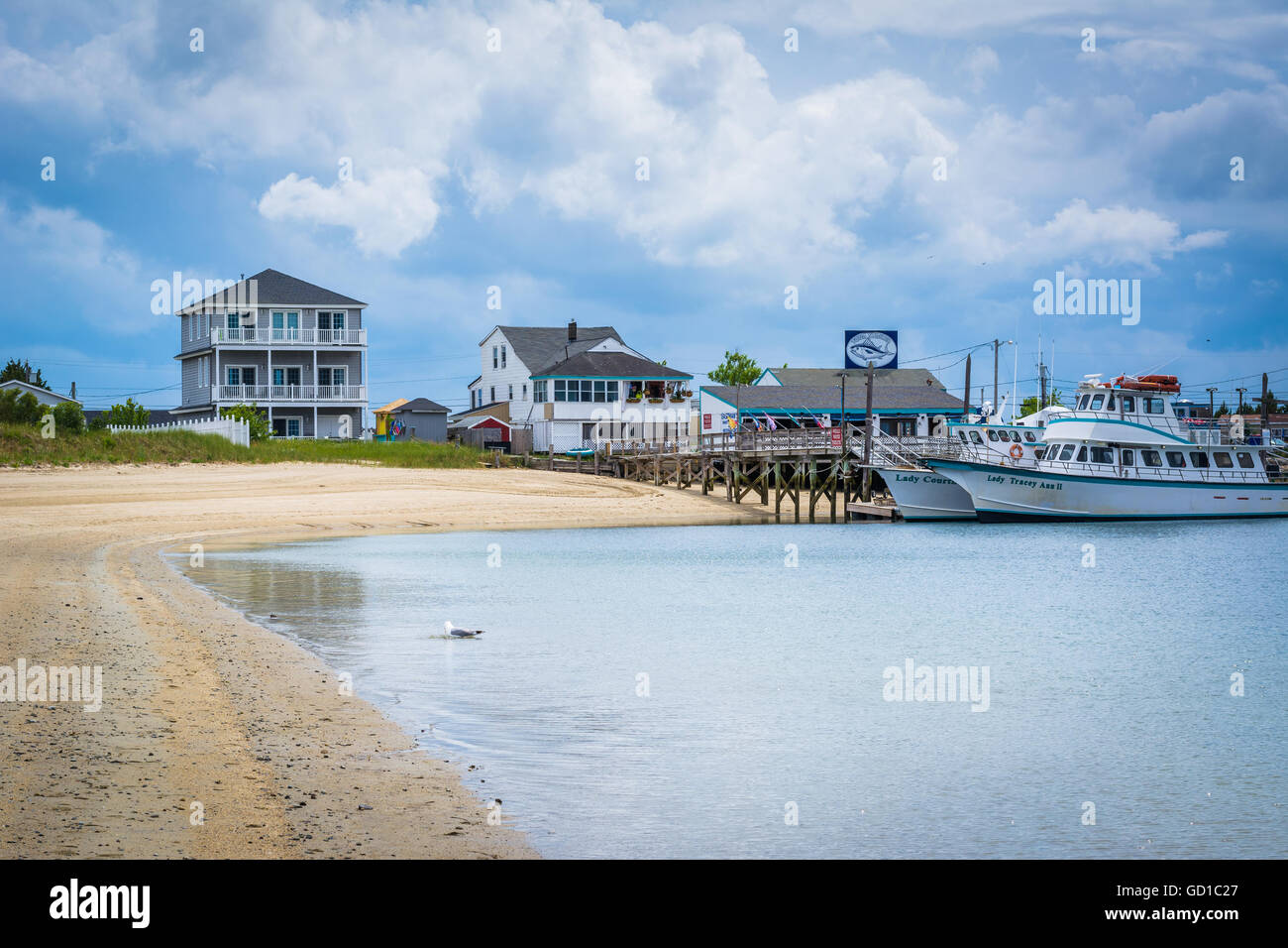 Houses and boats along Hampton Harbor, in Hampton Beach, New Hampshire ...