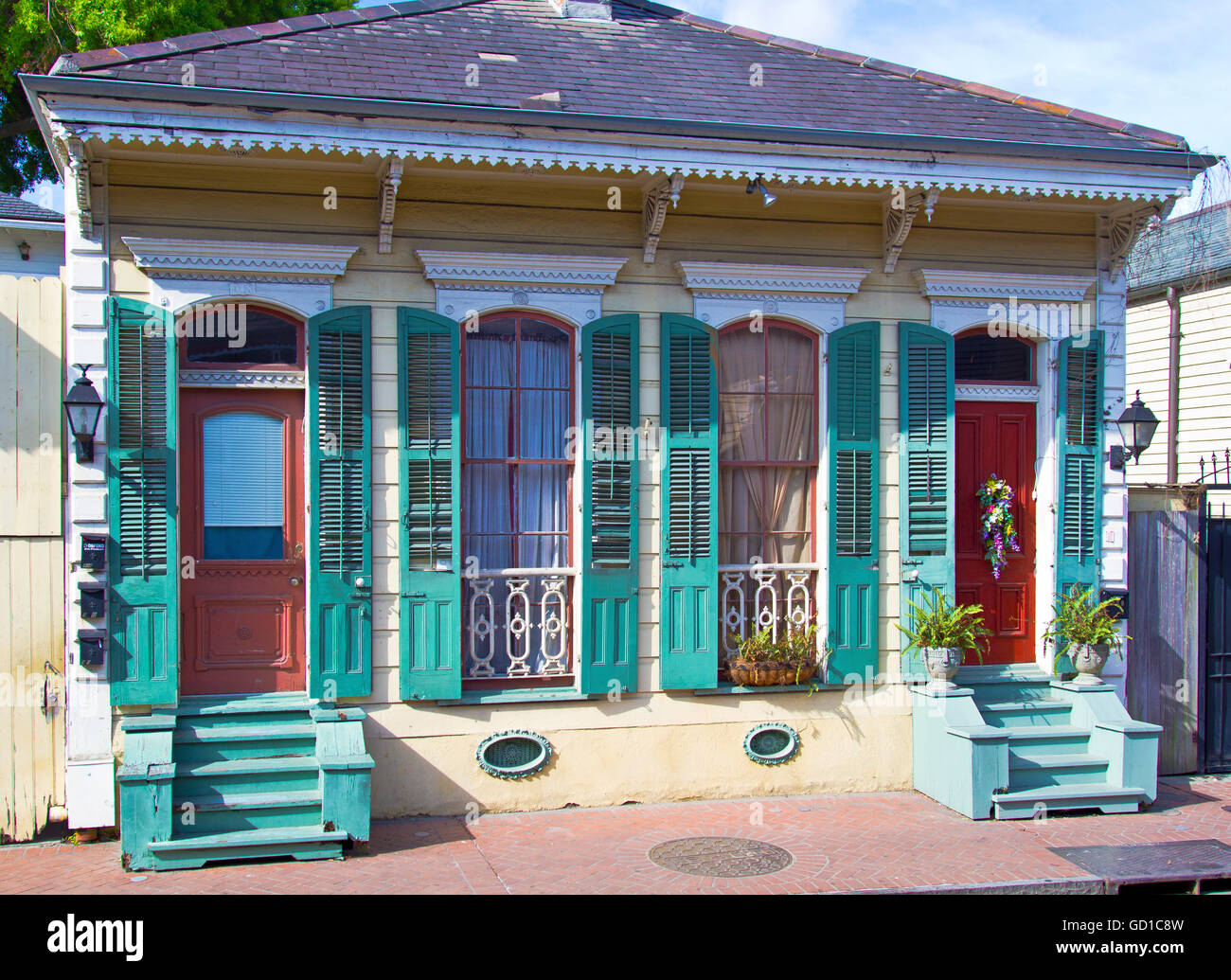 French Quarters style bungalow home with flower boxes in New Orleans ...