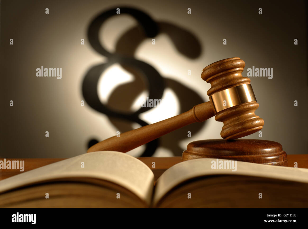 Gavel, legal code book and a section symbol Stock Photo - Alamy