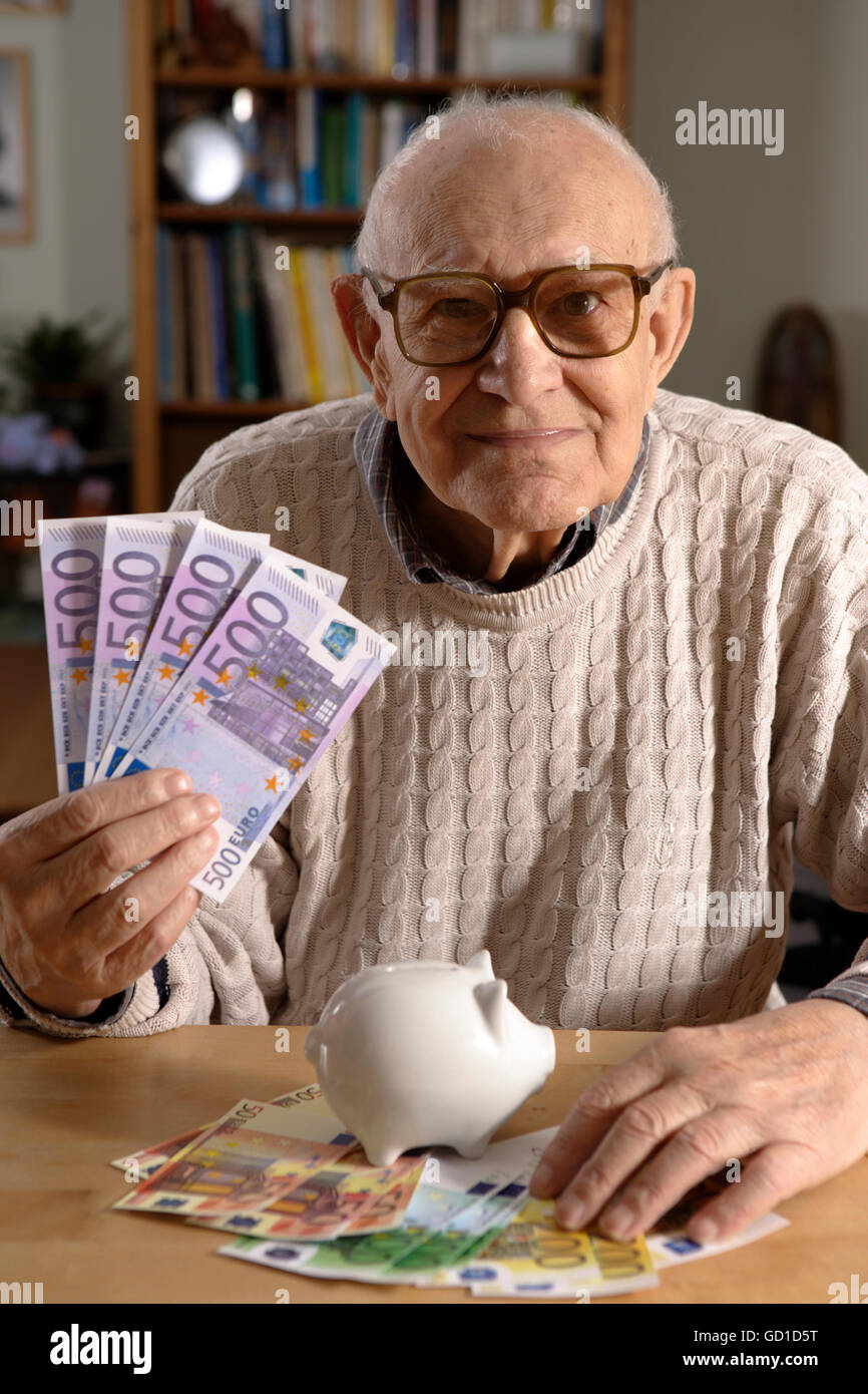 Old man, senior, 92 years old, with piggy bank and euro bank notes Stock Photo - Alamy
