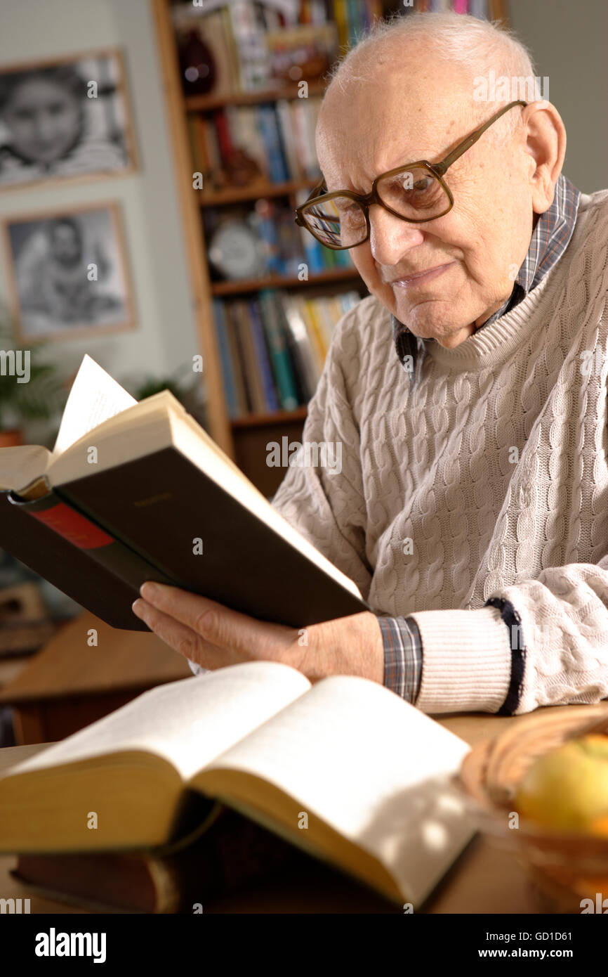 Old man, senior, 92 years, reading a book Stock Photo - Alamy