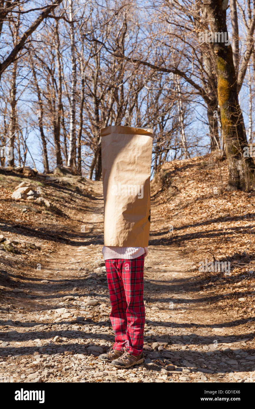 child with lots covering her head Stock Photo - Alamy