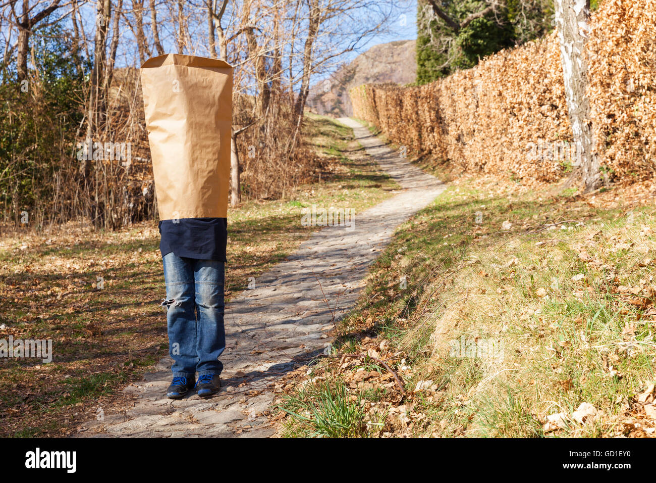 child with lots covering her head Stock Photo - Alamy