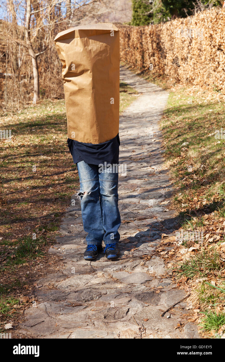 child with lots covering her head Stock Photo - Alamy