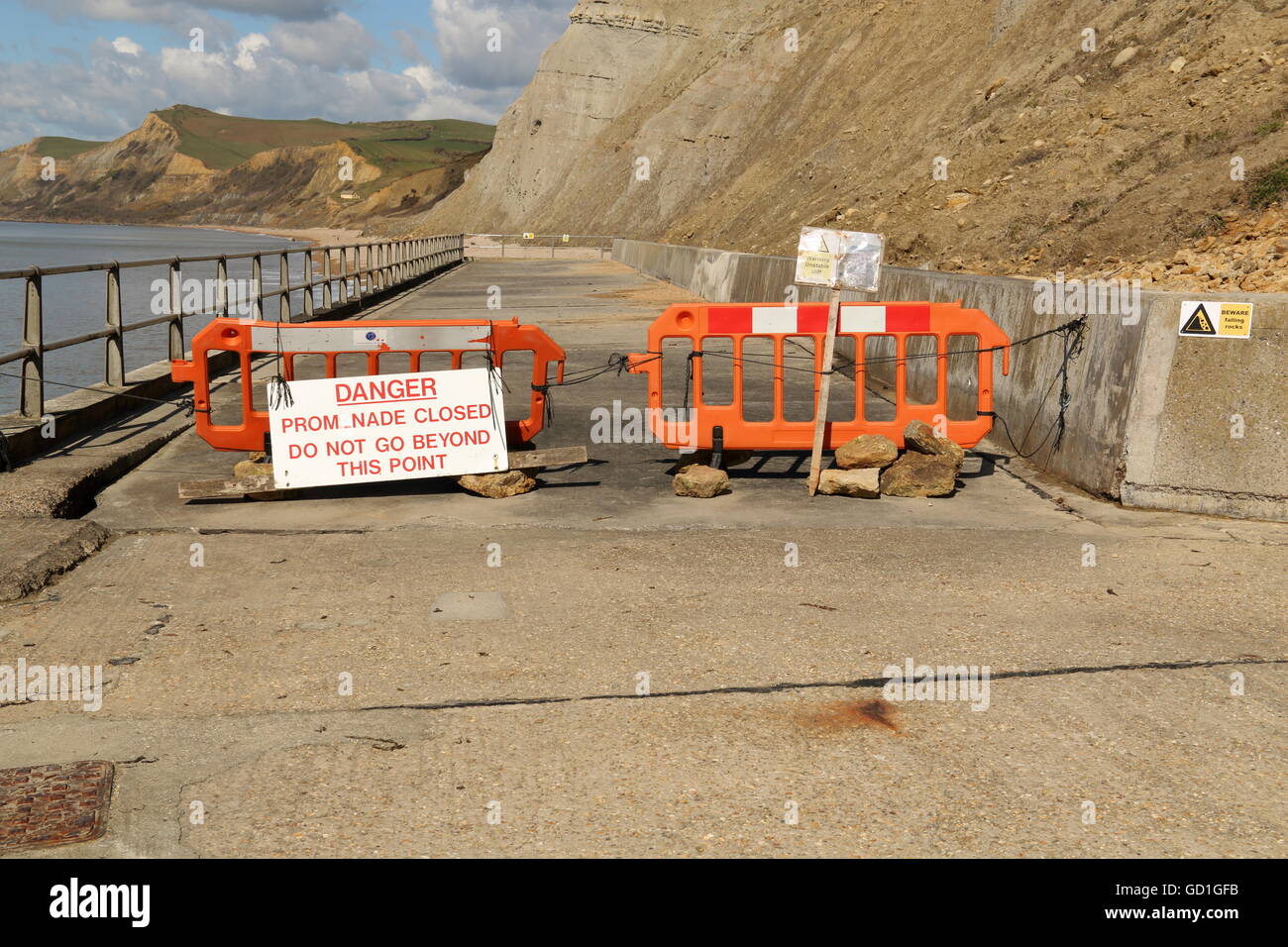 Barriers blocking promenade,West Bay,Dorset,UK Stock Photo - Alamy