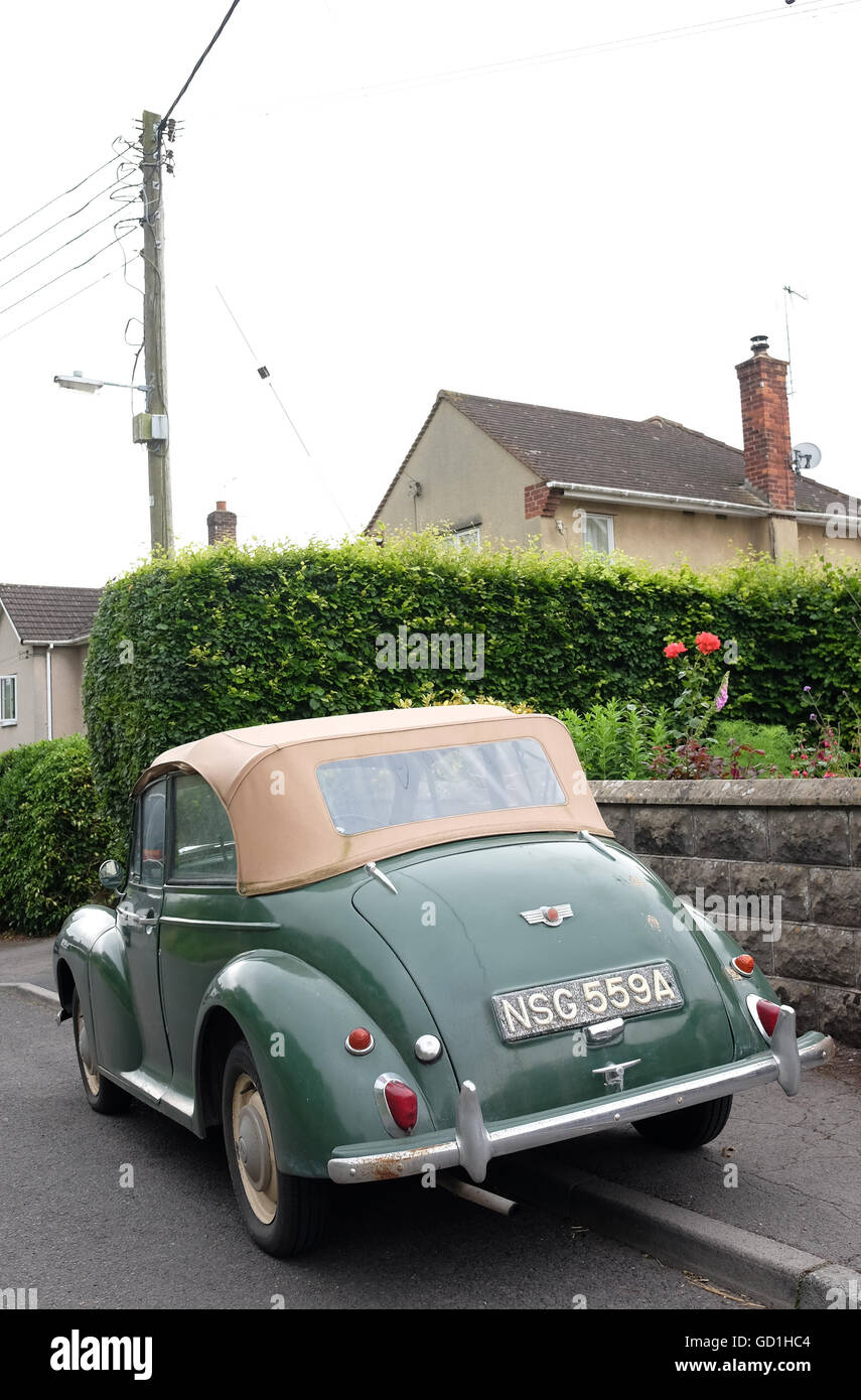 A green Morris Minor Convertible, soft top vintage classic car on the ...