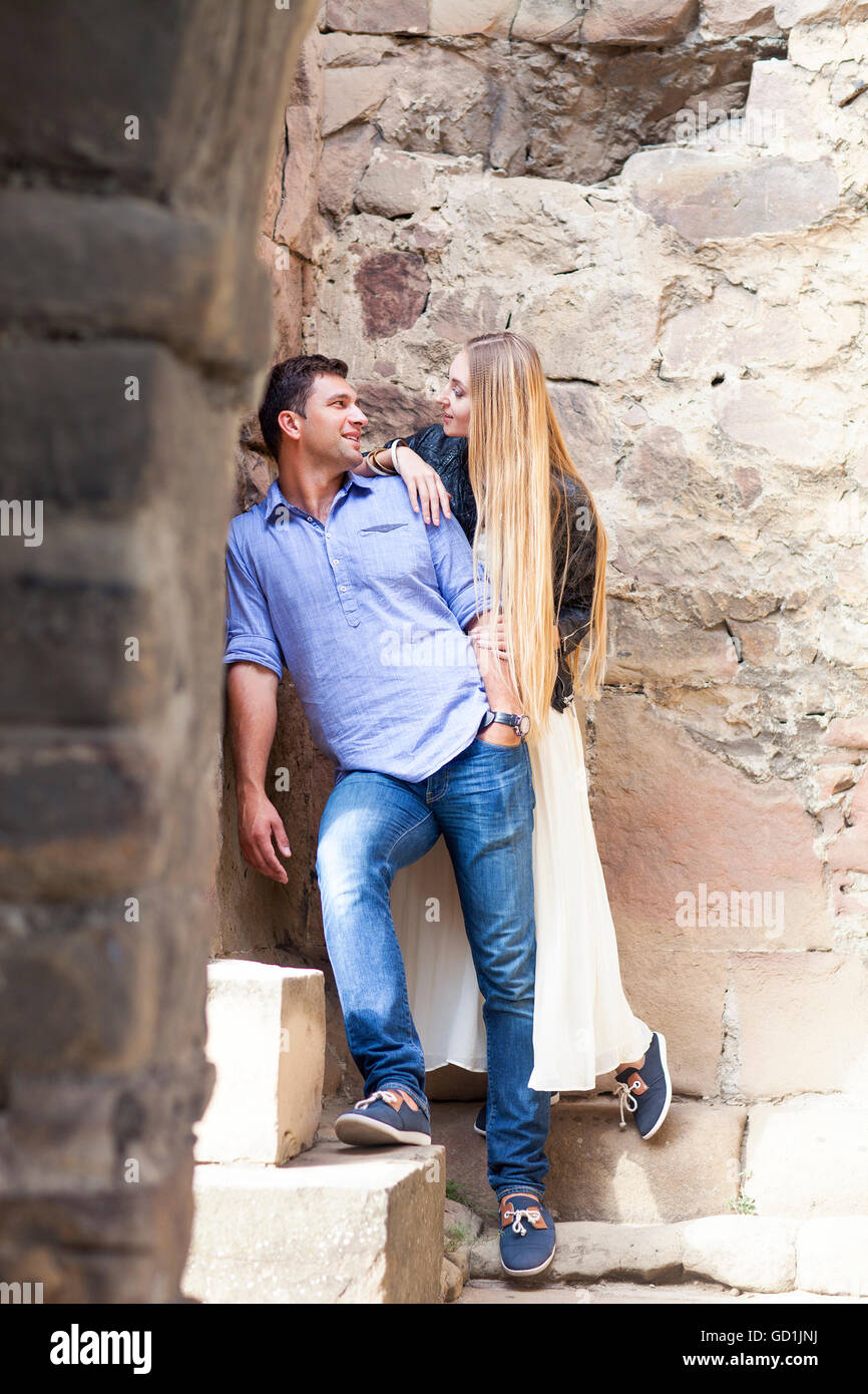 Beautiful happy smiling couple embracing outdoors Stock Photo - Alamy