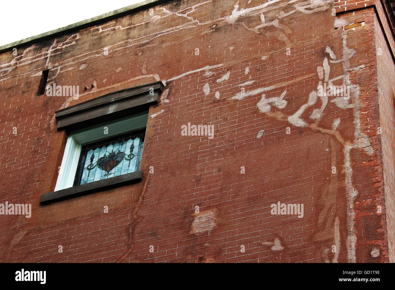 Old urban building with stained glass window Stock Photo - Alamy
