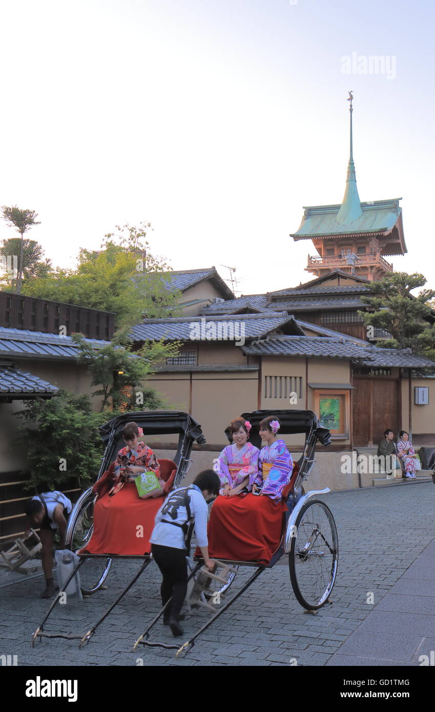 People ride Jinrikisha in Higashiyama Kyoto Japan Stock Photo - Alamy