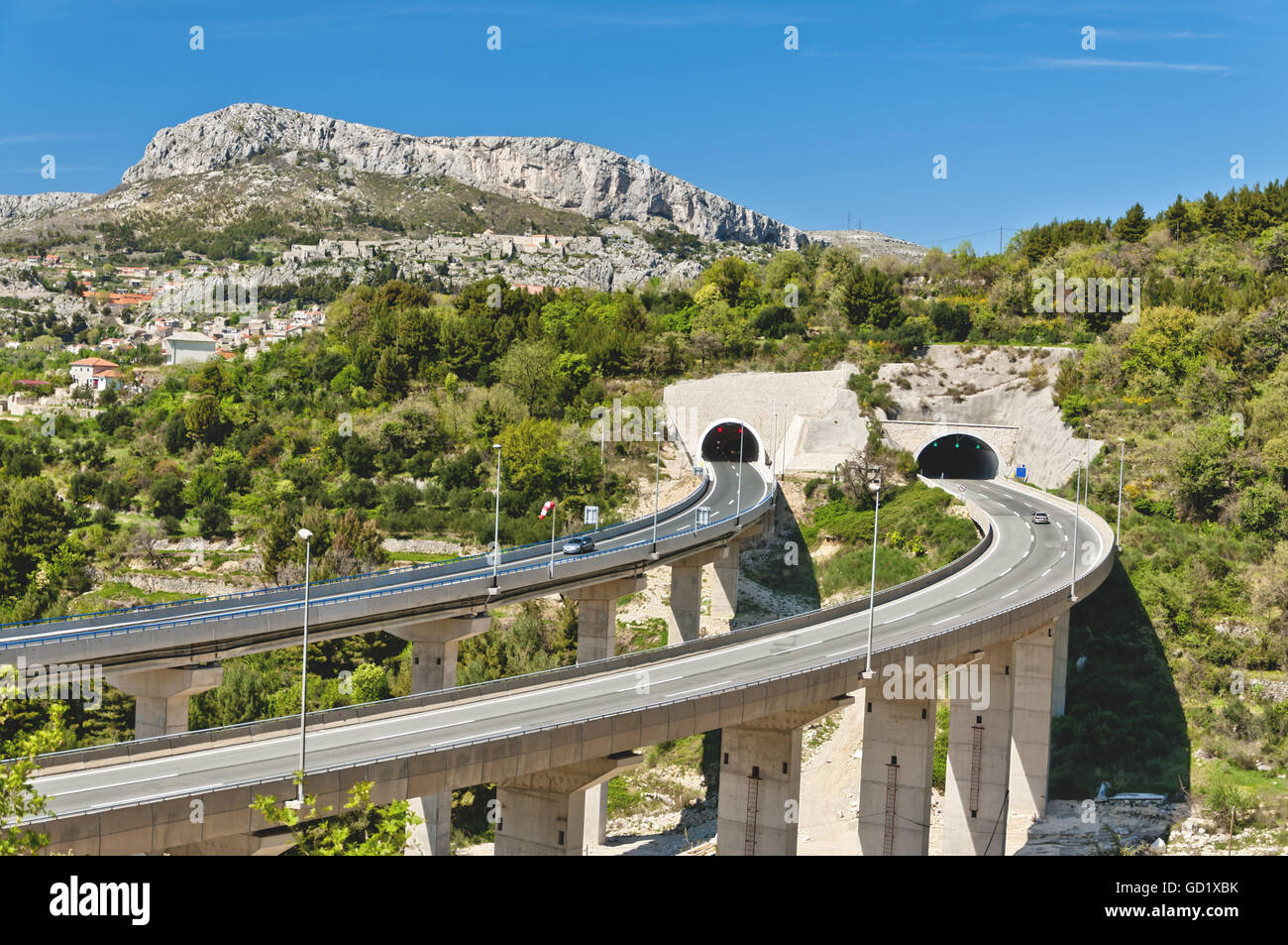croatian motorway with curved viaducts and tunnel entrance near klis ...