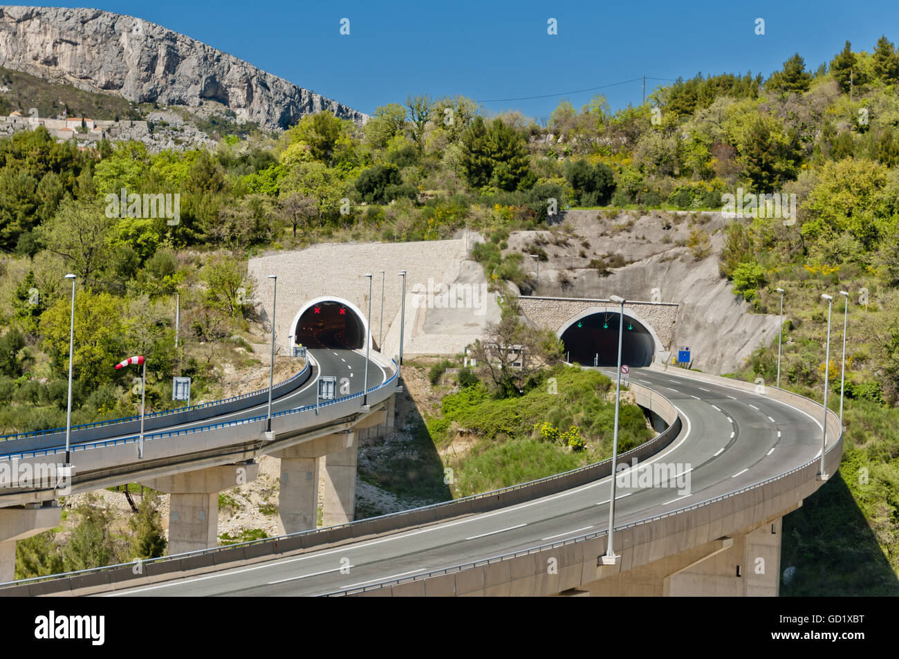 croatian motorway with curved viaducts and tunnel entrance near klis ...