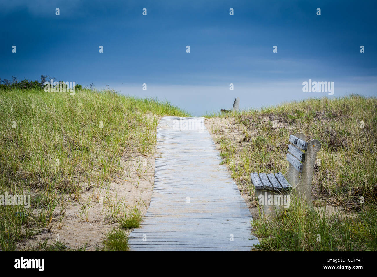 Benches along a walkway over sand dunes to the beach in Seabrook Beach ...