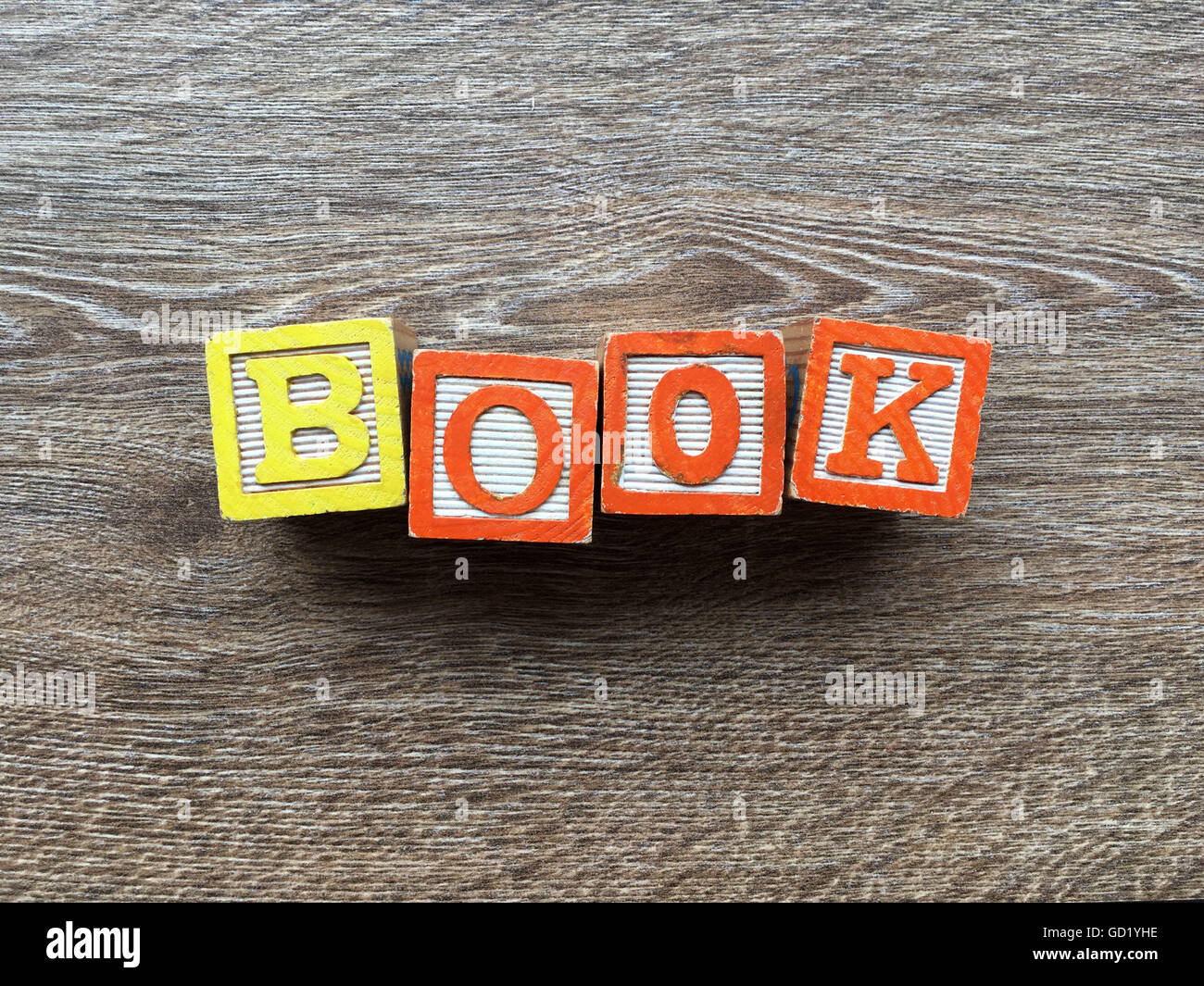BOOK word done with wood block letter toys Stock Photo - Alamy