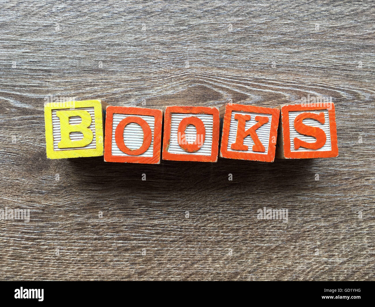 BOOKS word done with wood block letter toys Stock Photo - Alamy