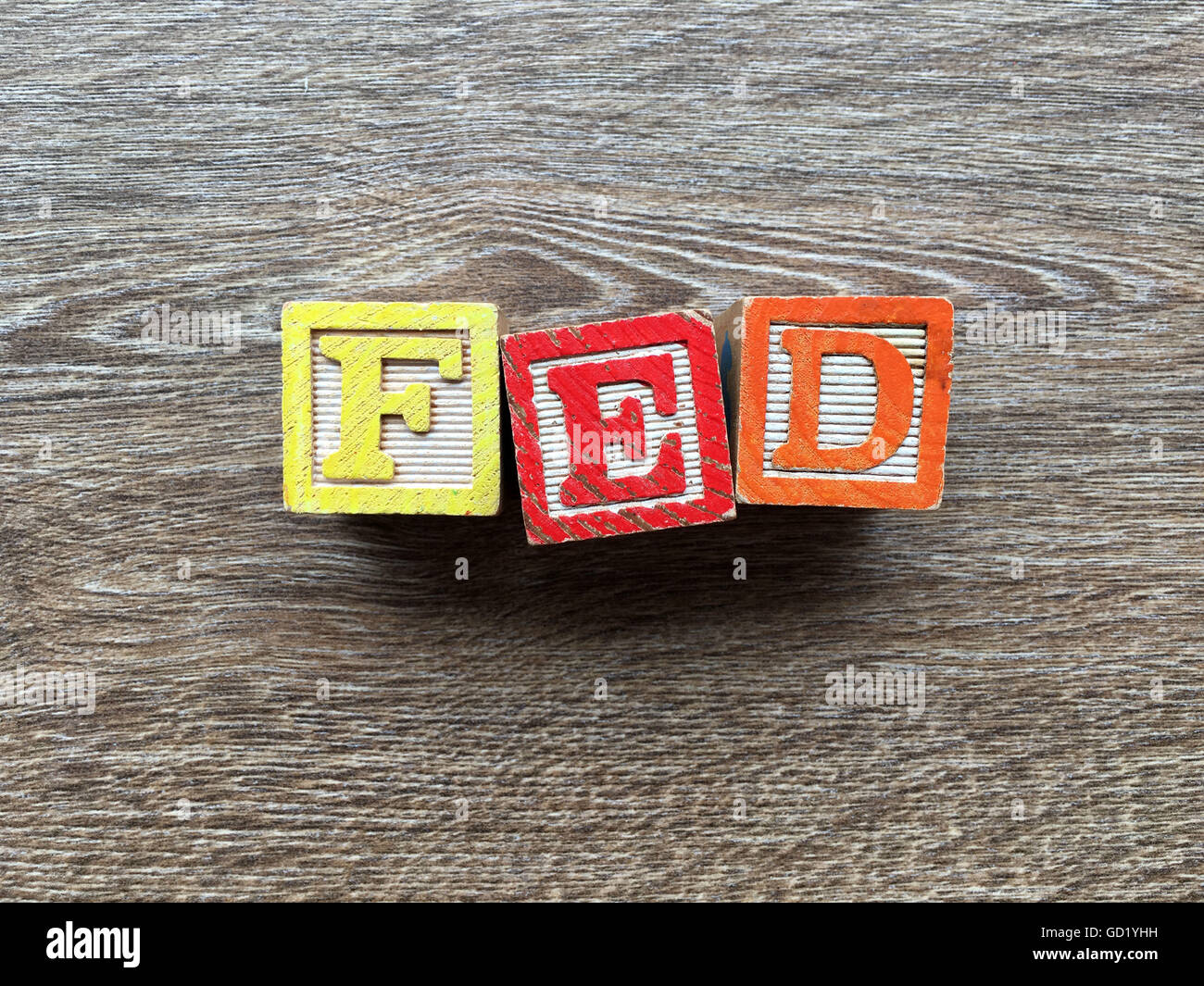 FED word written with wood block letter toys Stock Photo - Alamy