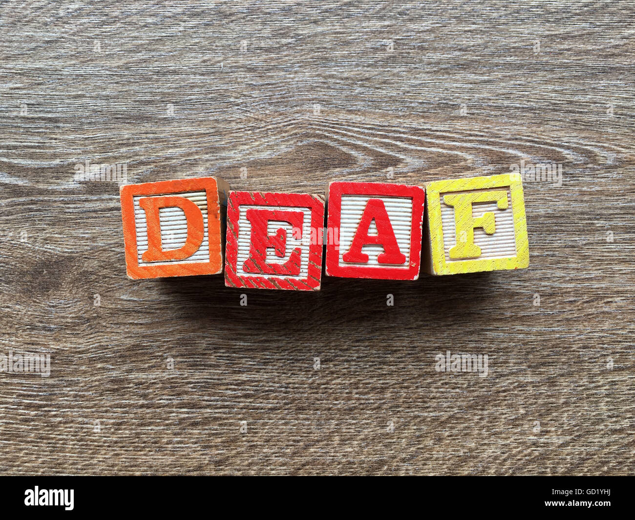 DEAF word written with wood block letter toys Stock Photo - Alamy