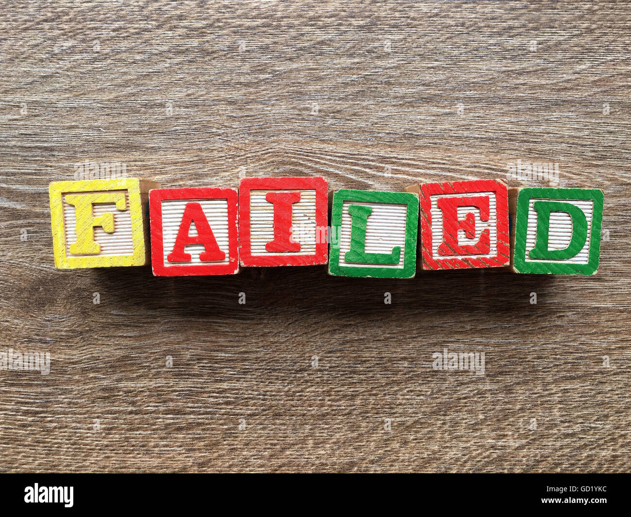 FAILED word written with wood block letter toys Stock Photo - Alamy