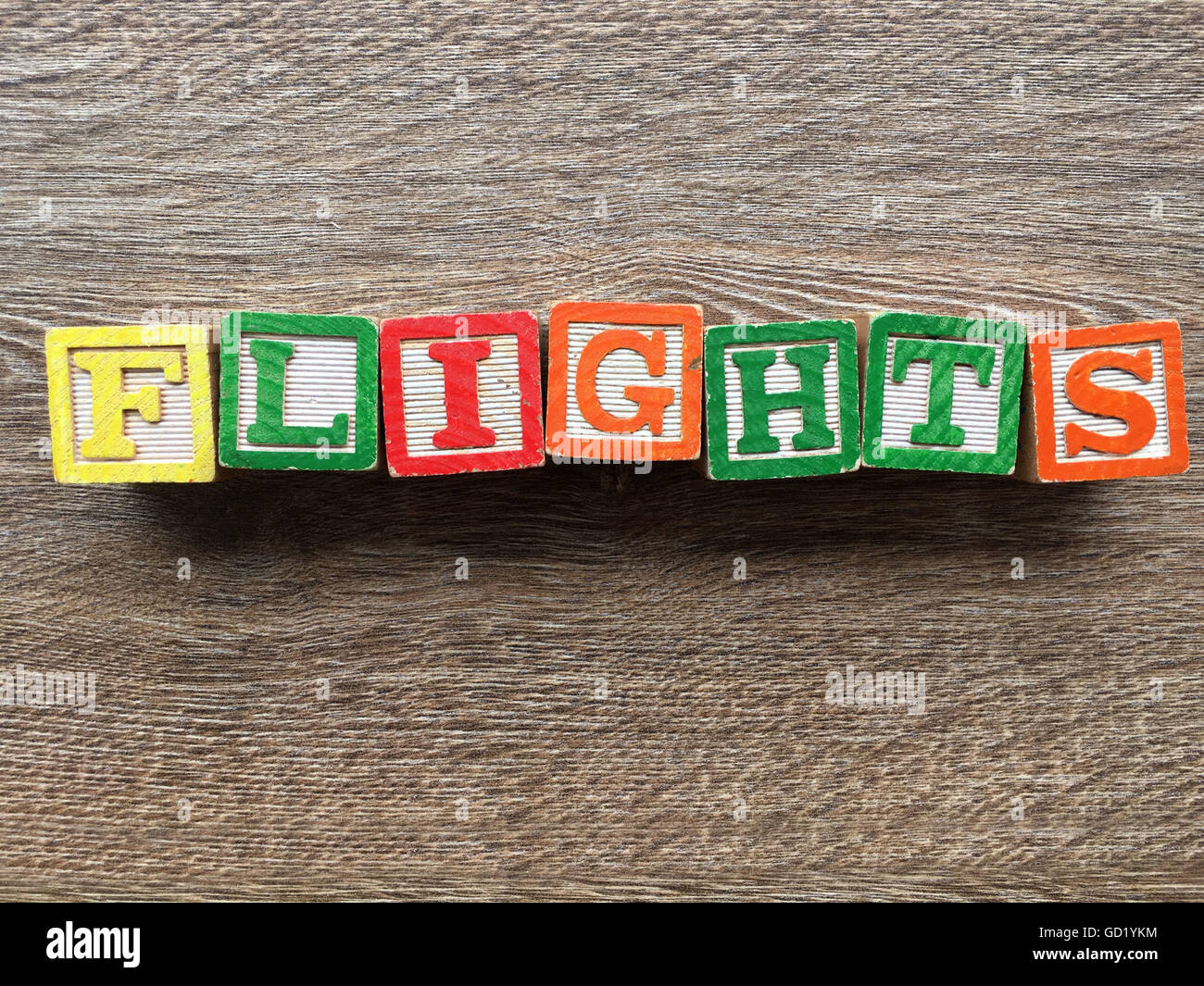 FLIGHTS word done with wood block letter toys Stock Photo - Alamy