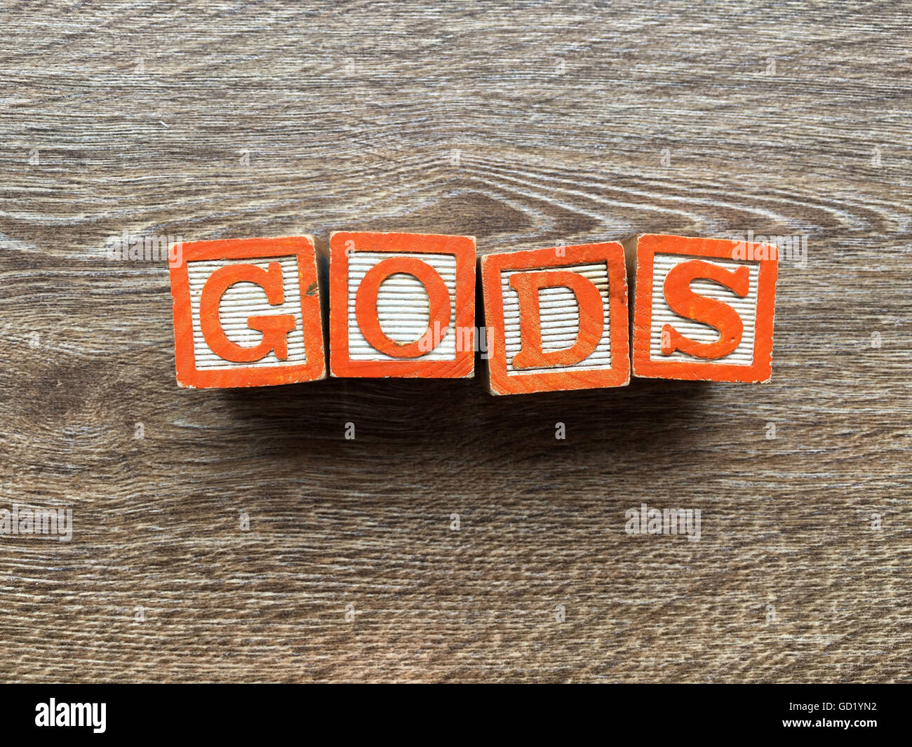 GODS word written with wood block letter toys Stock Photo - Alamy