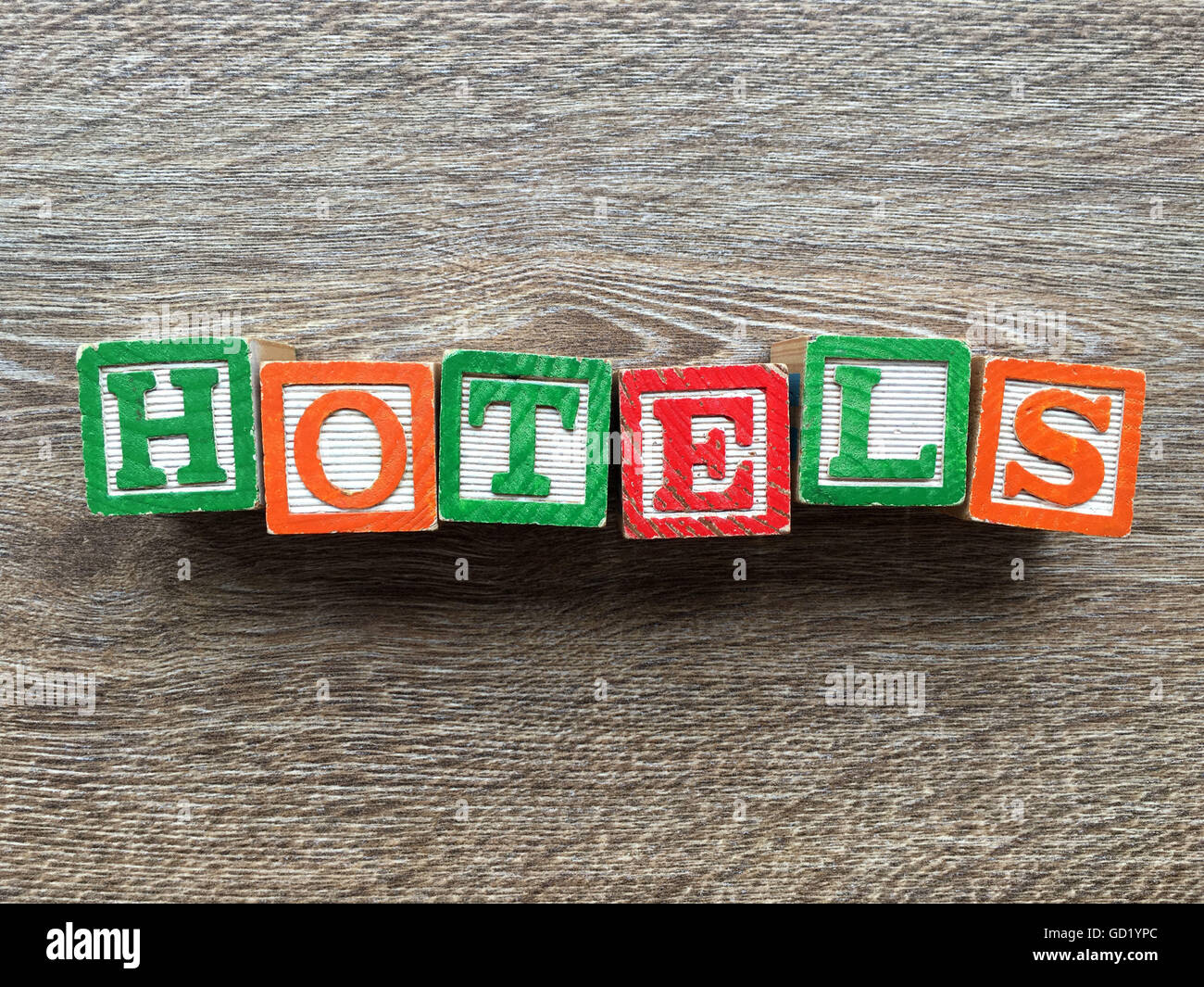 HOTELS word written with wood block letter toys Stock Photo - Alamy
