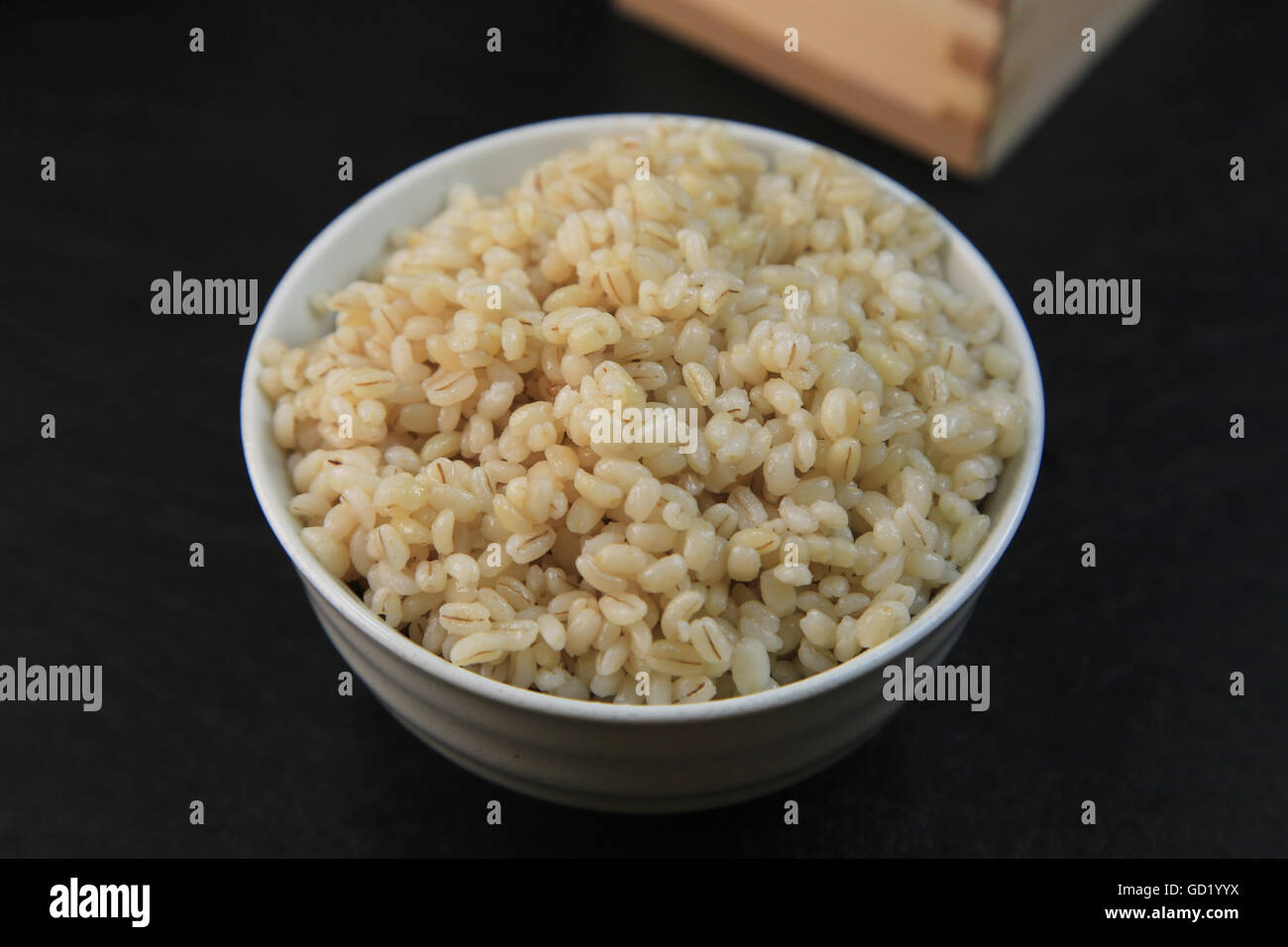 Boiled barley rice Stock Photo - Alamy