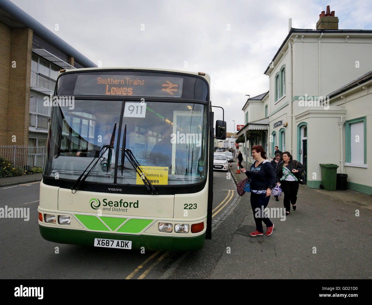 People board a rail replacement bus outside Seaford Station in East ...