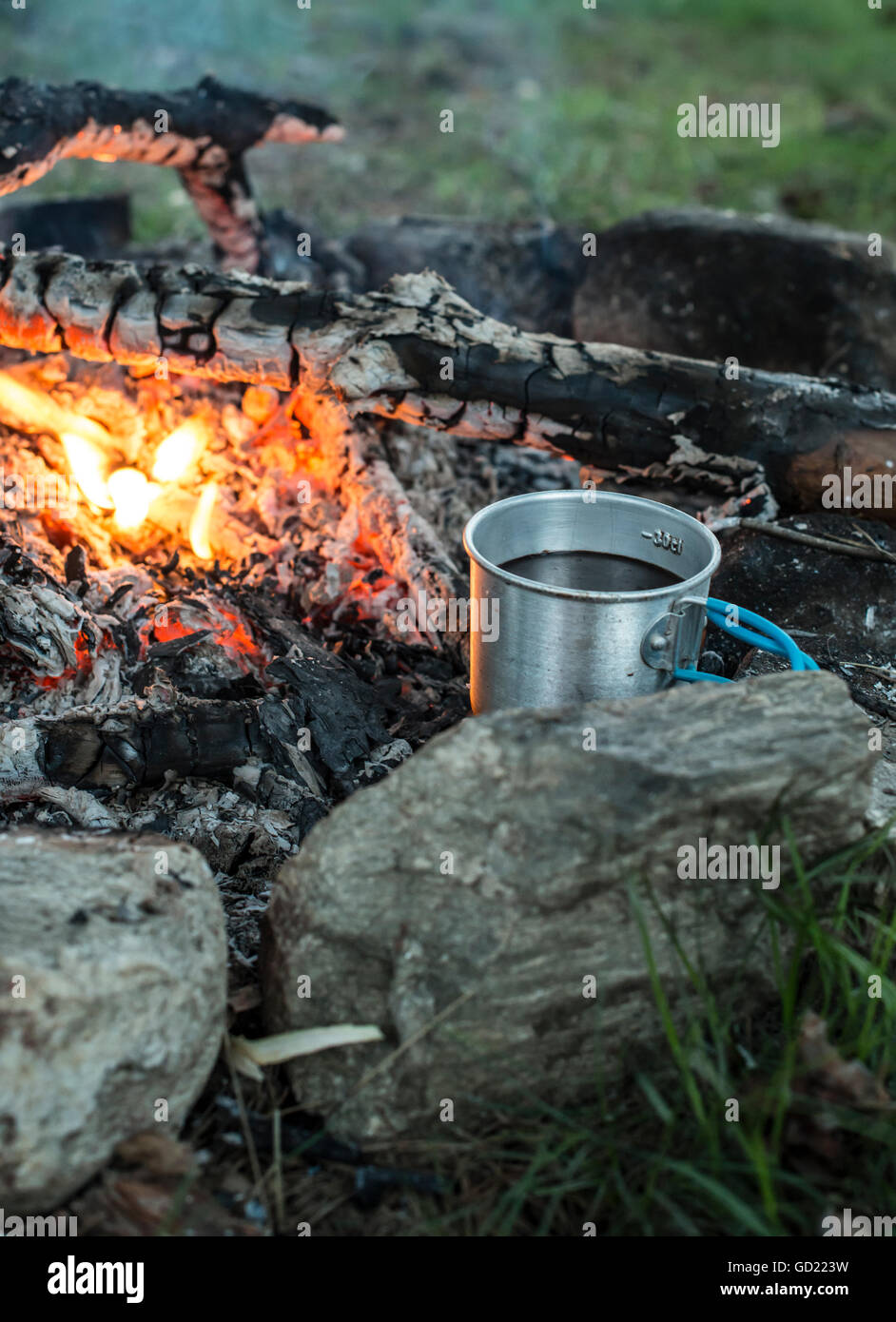 Tea kettle on campfire in hi-res stock photography and images - Alamy