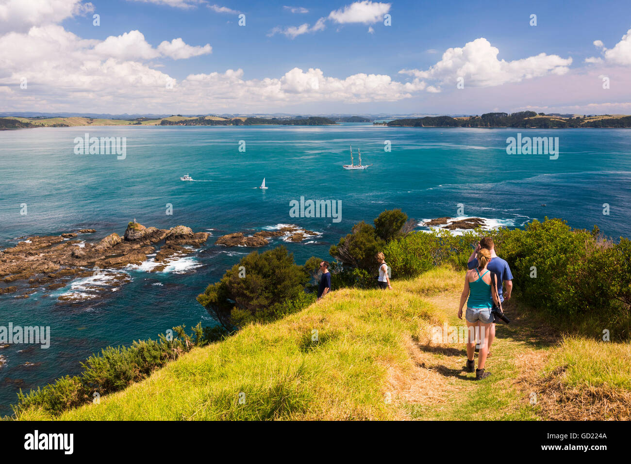 Family walking on Tapeka Point, Russell, Northland Region, North Island ...