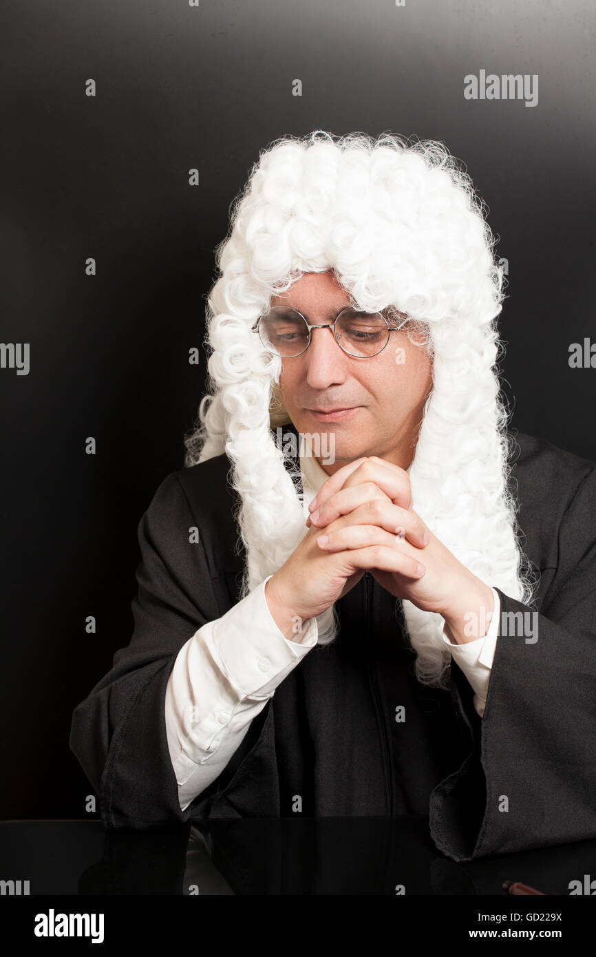 Portrait Of Male Judge in a wig on black background Stock Photo - Alamy
