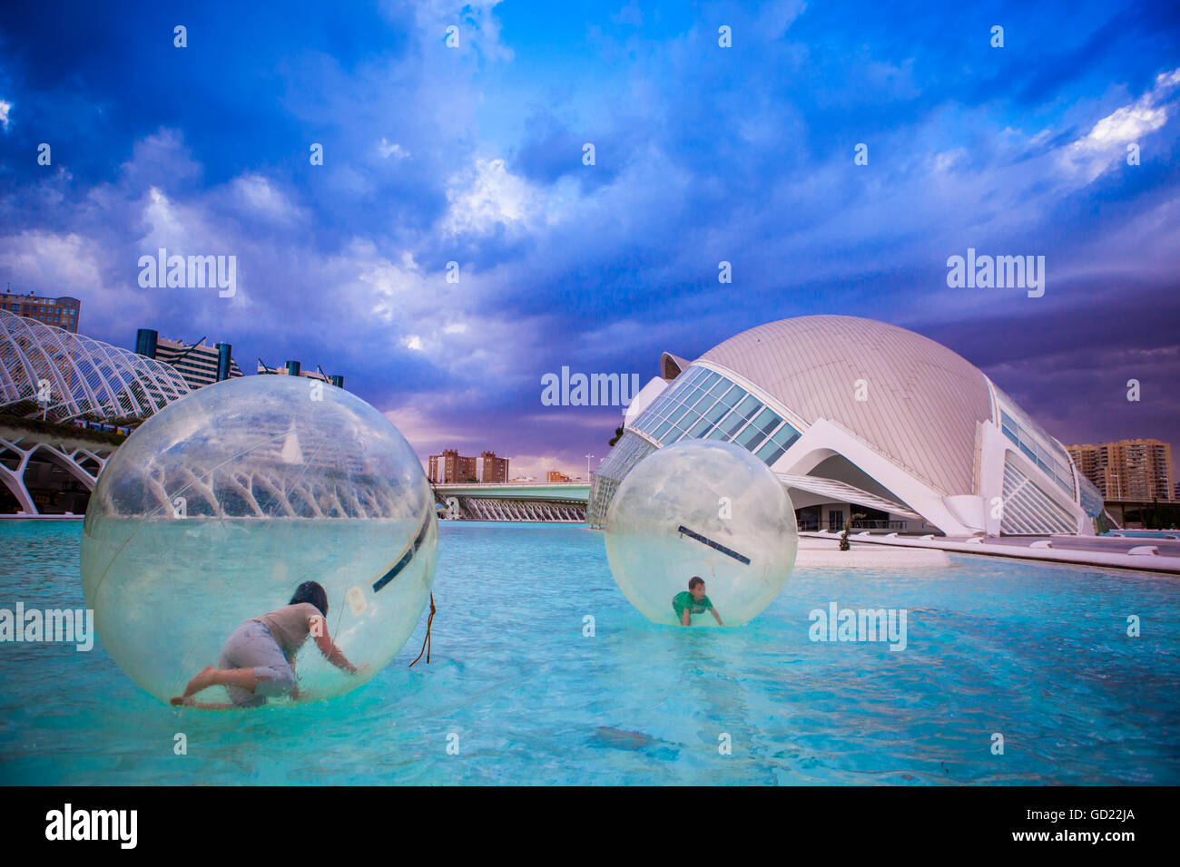 Kids playing in floating orbs hi-res stock photography and images - Alamy