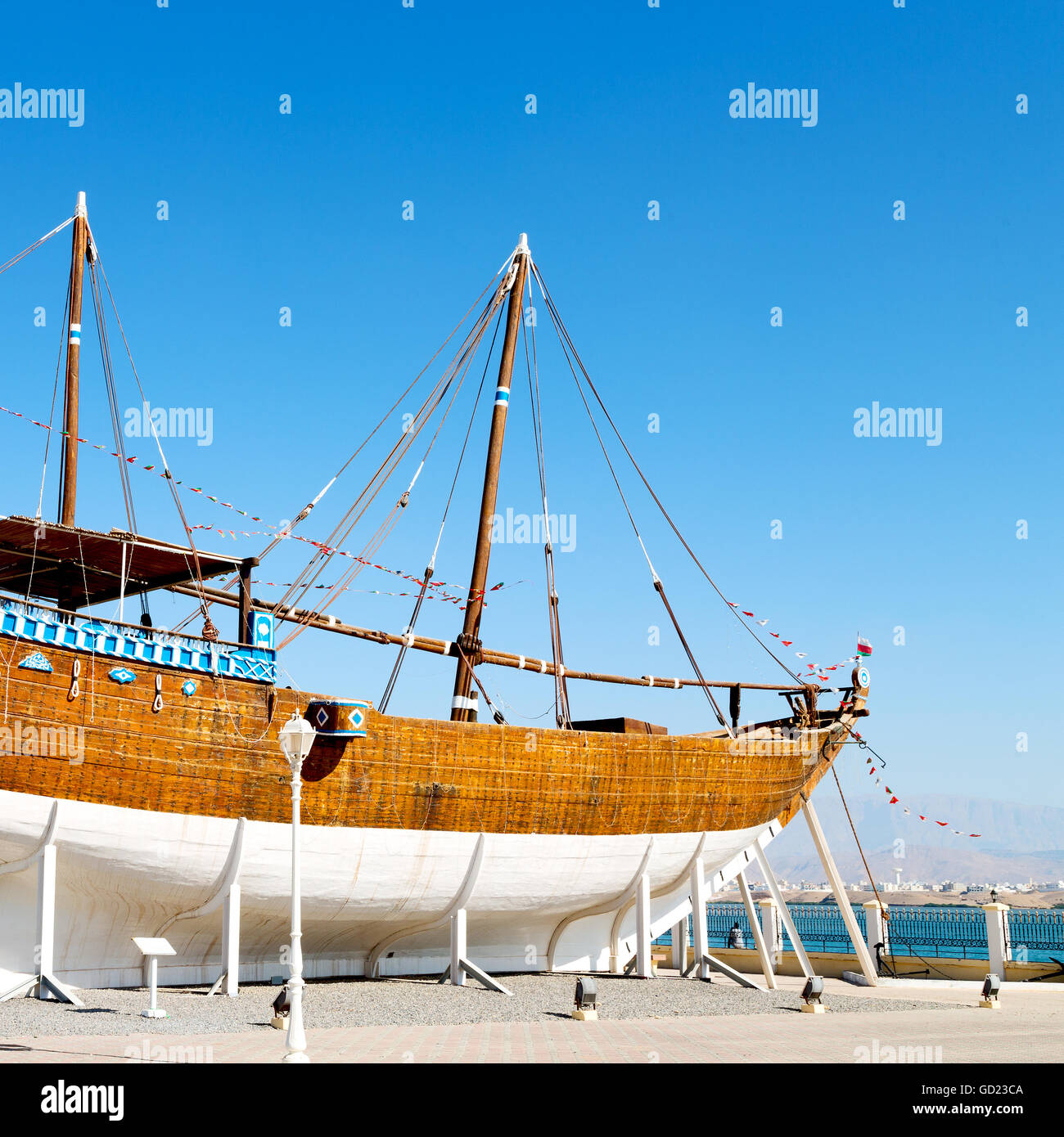 in oman old boat in the sidewalk near the sea Stock Photo - Alamy