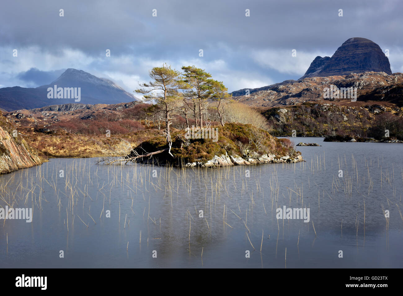 Two mountains of Silvan and Canisp from Loch Druim Suardalain ...