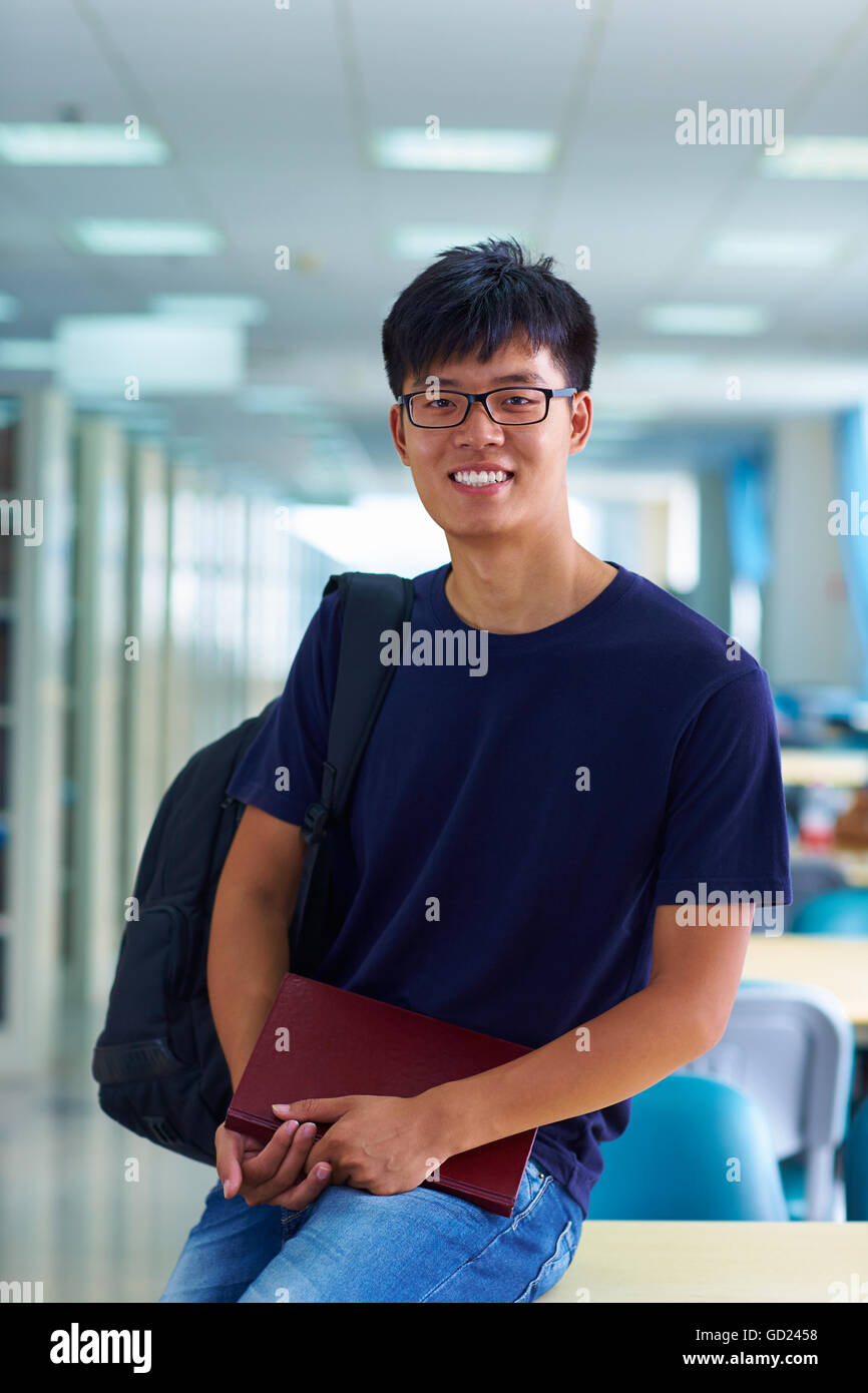 Young man asian student glasses hi-res stock photography and images - Alamy