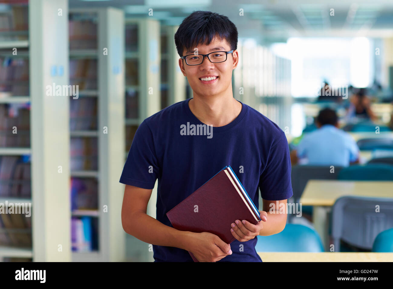 Handsome male student classroom hi-res stock photography and images - Alamy