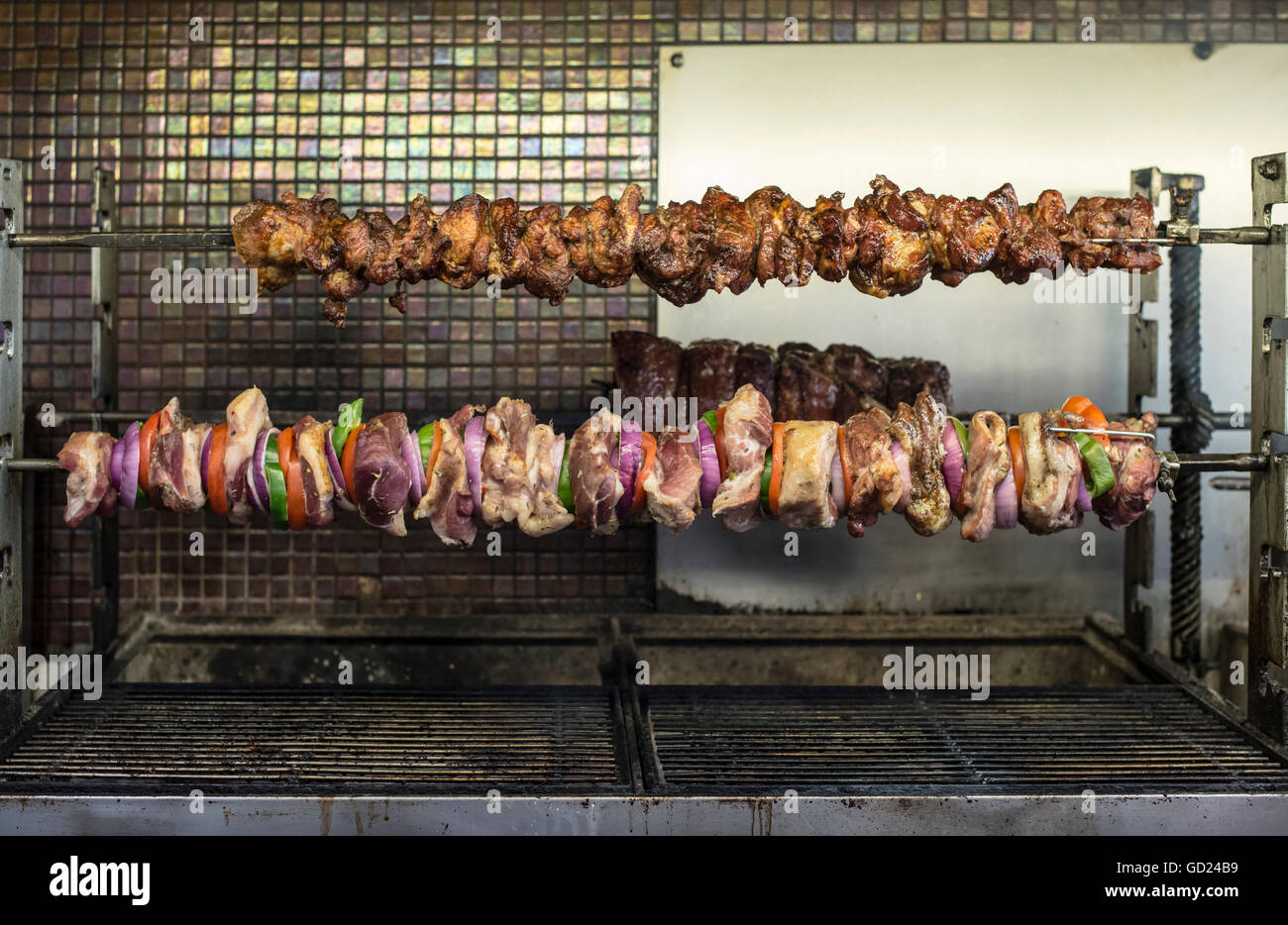 Traditional greek food Souvlaki. Meat grilled on a skewer Stock Photo ...