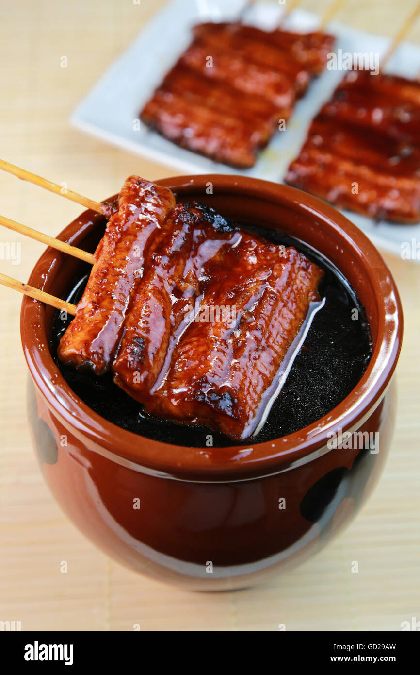 Broiled eel dipped in sweet soy sauce base sauce hi-res stock ...