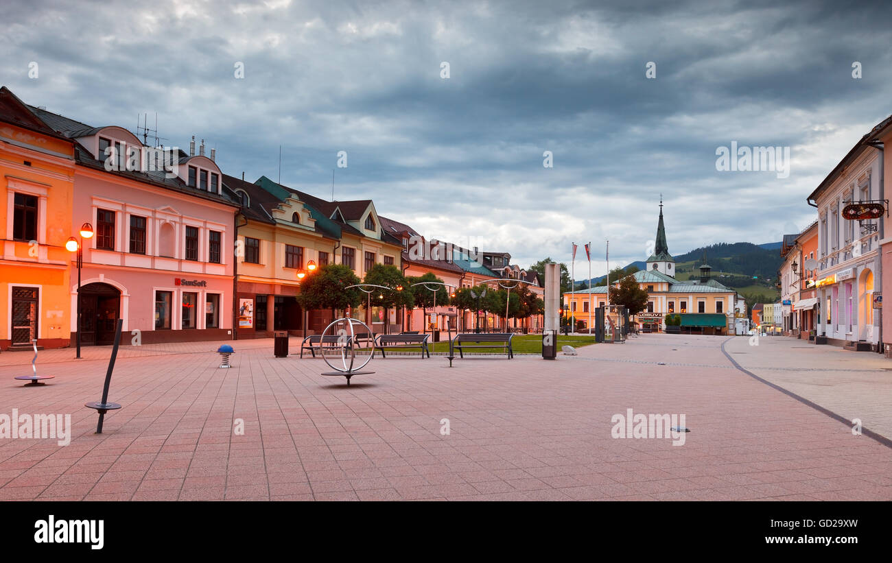 Main square of Dolny Kubin late in the evening Stock Photo - Alamy