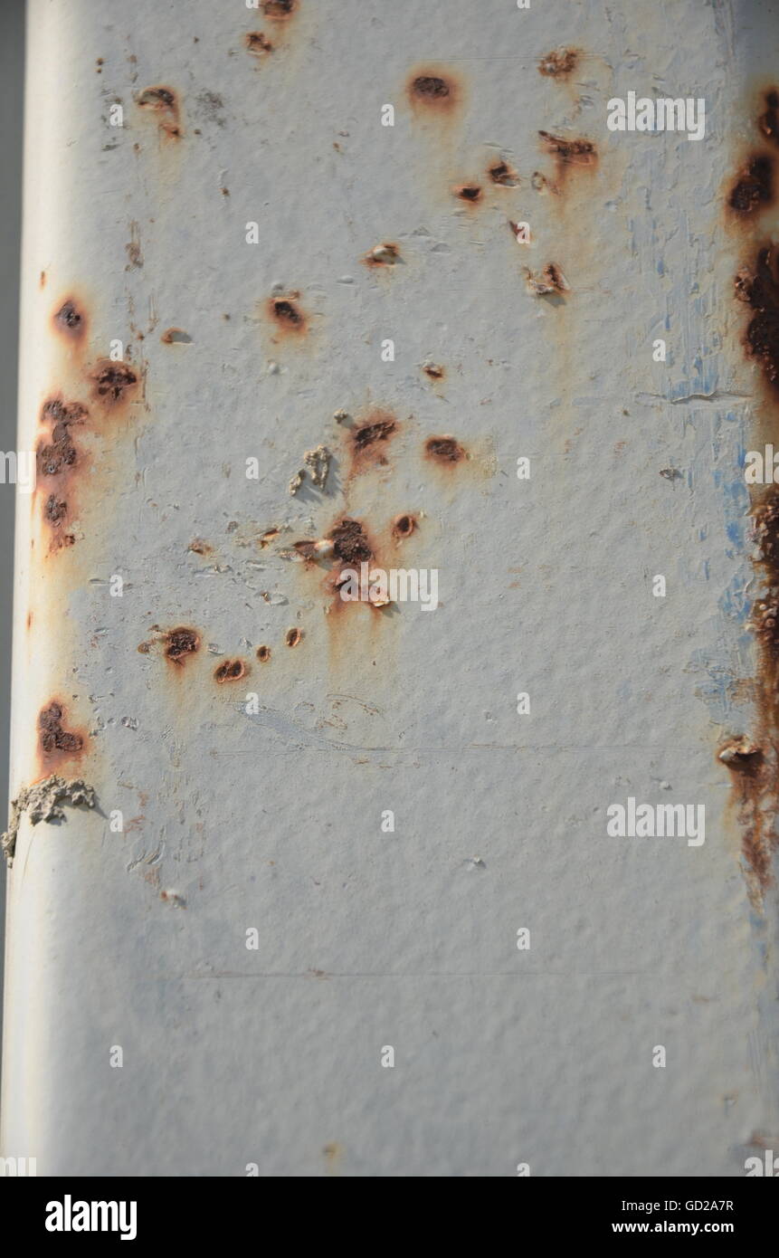 White paint, rust spots, rust, rusting, rusted, steel, iron, closeup ...