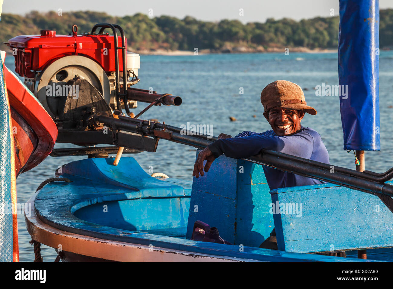 Smiling Thai fisherman Stock Photo - Alamy