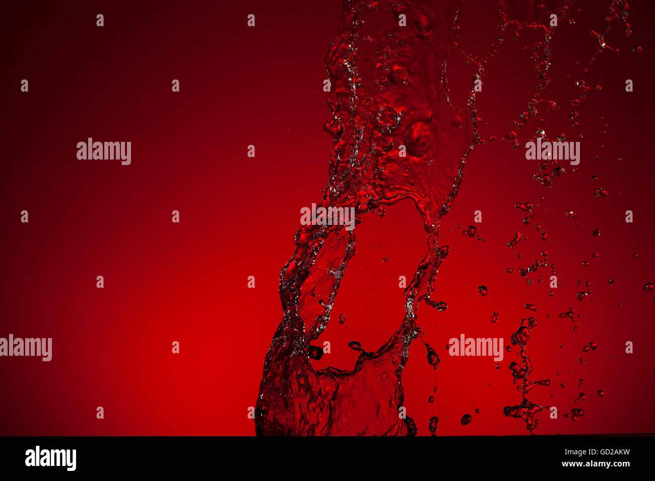 Water texture on a red background Stock Photo - Alamy