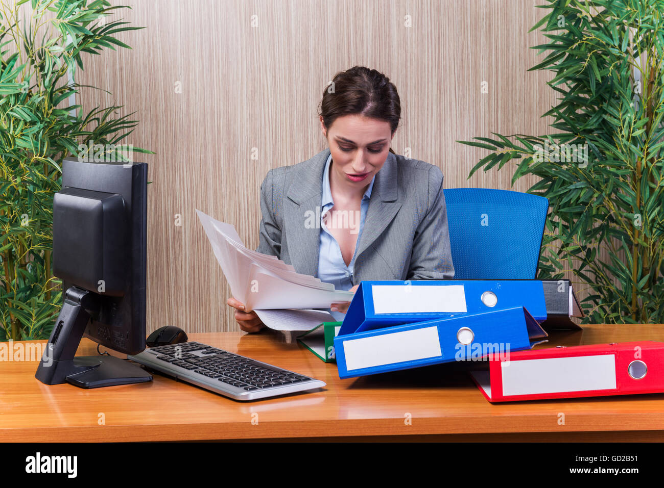 Tired woman stressed with too much work Stock Photo - Alamy