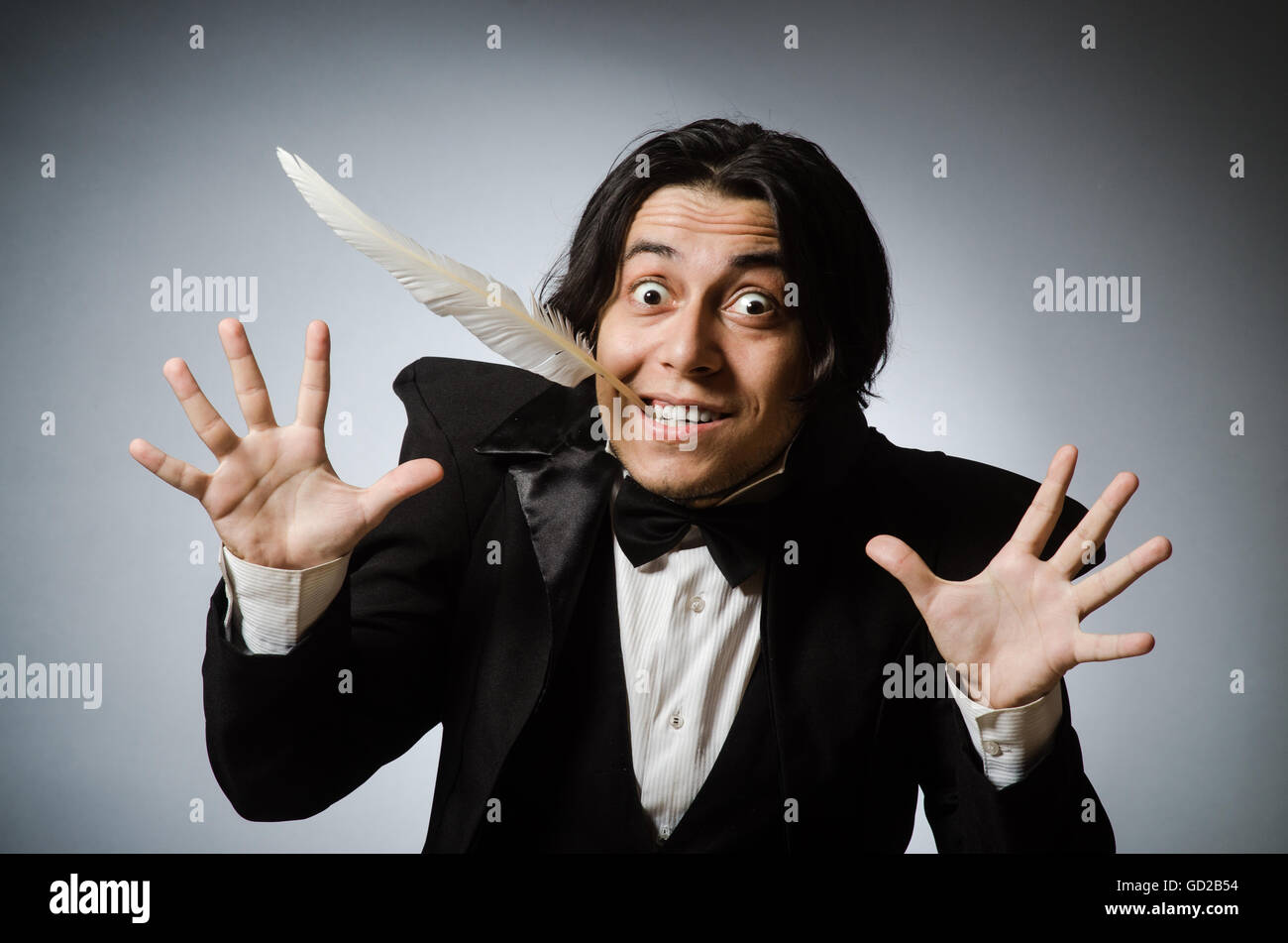 Funny writer with quill in vintage concept Stock Photo - Alamy