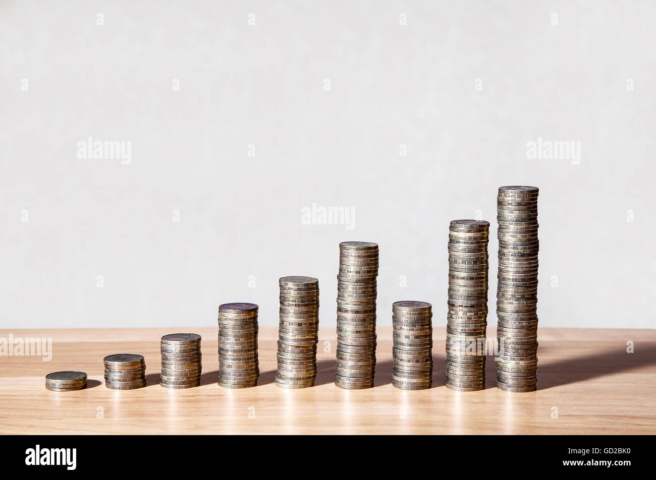 Columns coins on light hi-res stock photography and images - Alamy