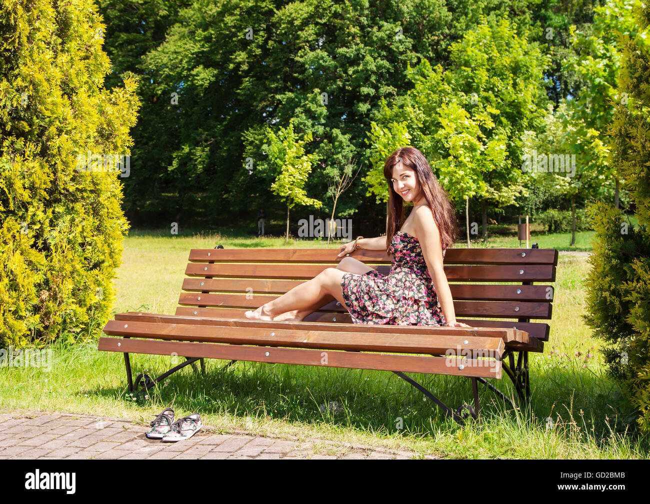 Lady Sitting On A Park Bench Stock Photos & Lady Sitting On A Park ...